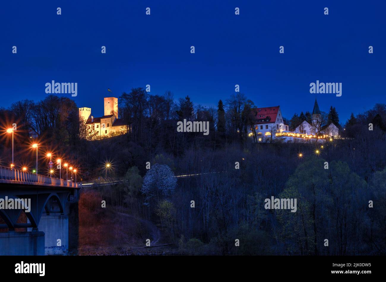 View of Grünwald with Grünwald Castle and Grünwald Bridge at night ...
