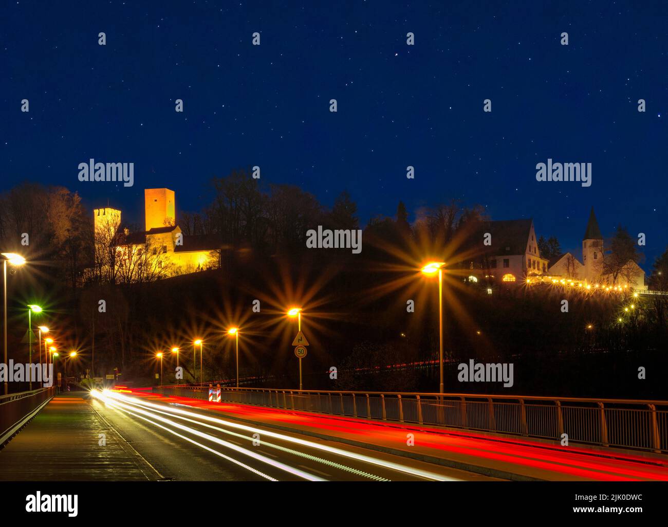 View of Grünwald with Grünwald Castle and Grünwald Bridge at night ...