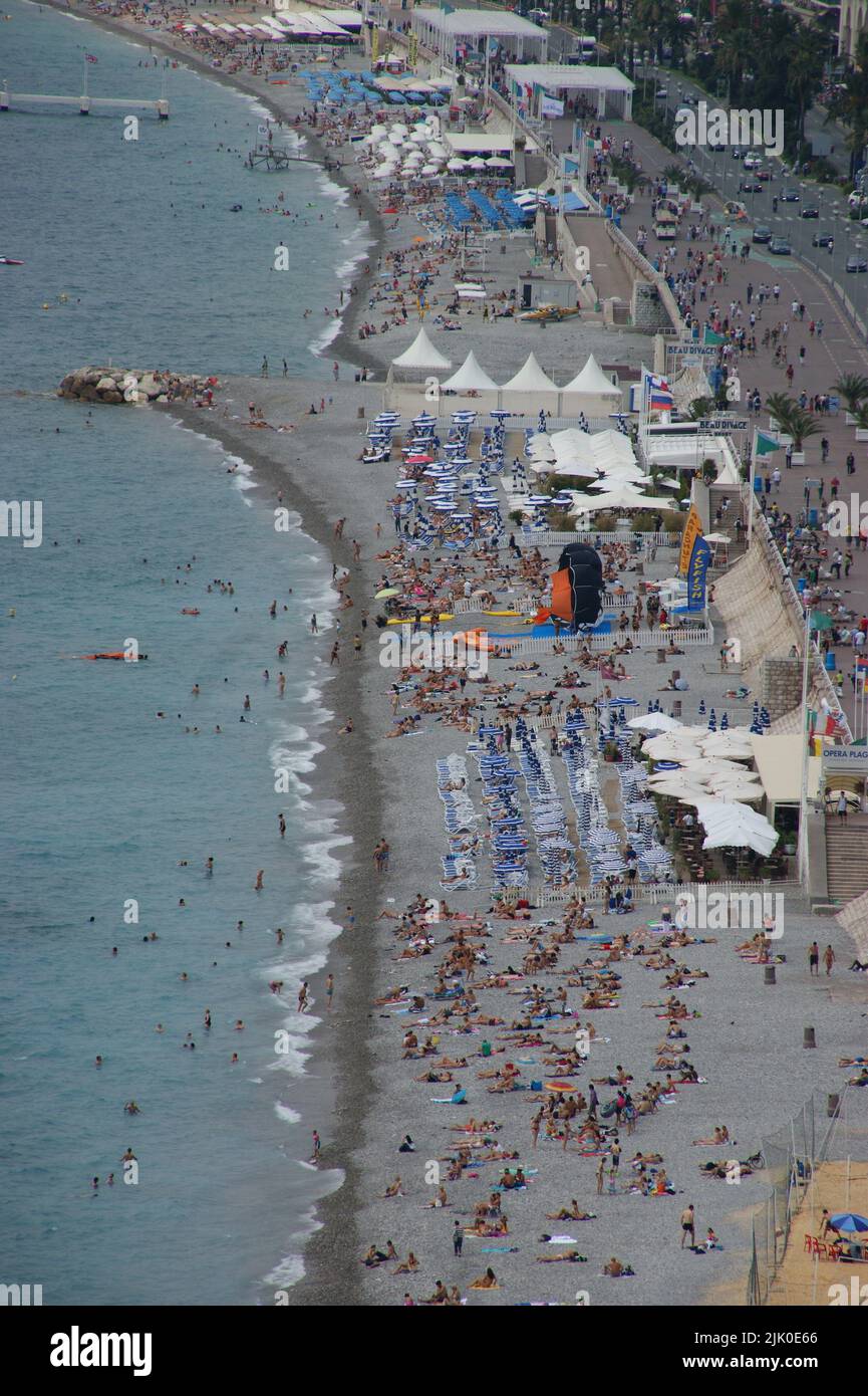 The Cote d'Azur beach in Nice, France, summer views, people, city ...