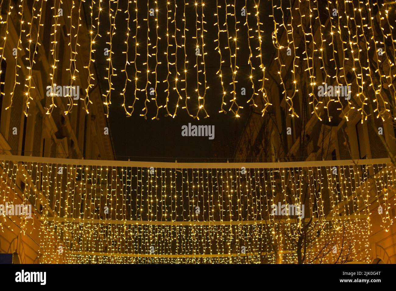 Gold Illuminated Christmas lights Stock Photo - Alamy