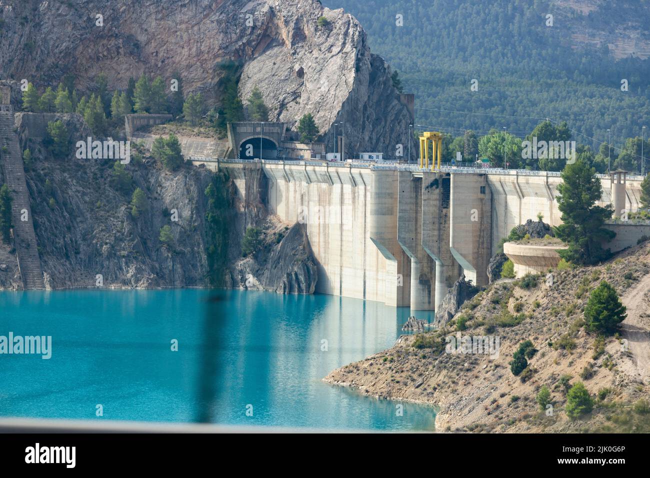Swamp. Reservoir. Reservoir filled with blue colored water. Dam located ...
