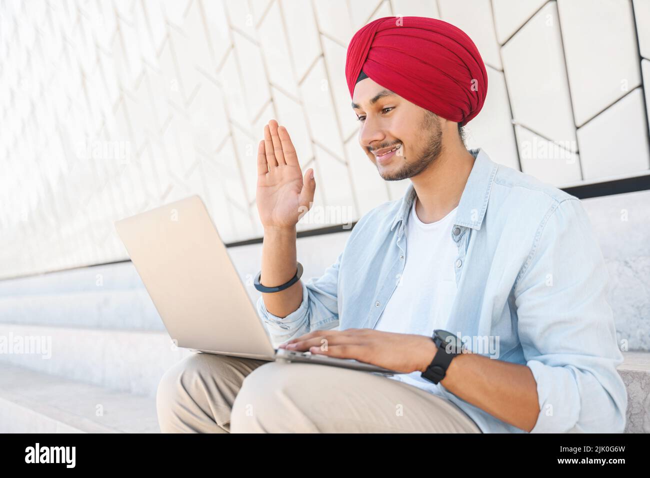 Hilarious Indian man in red national turban using laptop for video ...