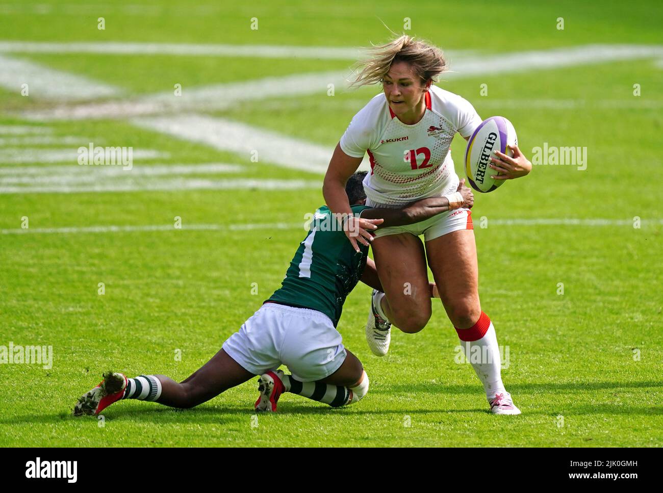 Sri Lanka's Anushika Samaraweera (left) tackles England's Amy Wilson ...