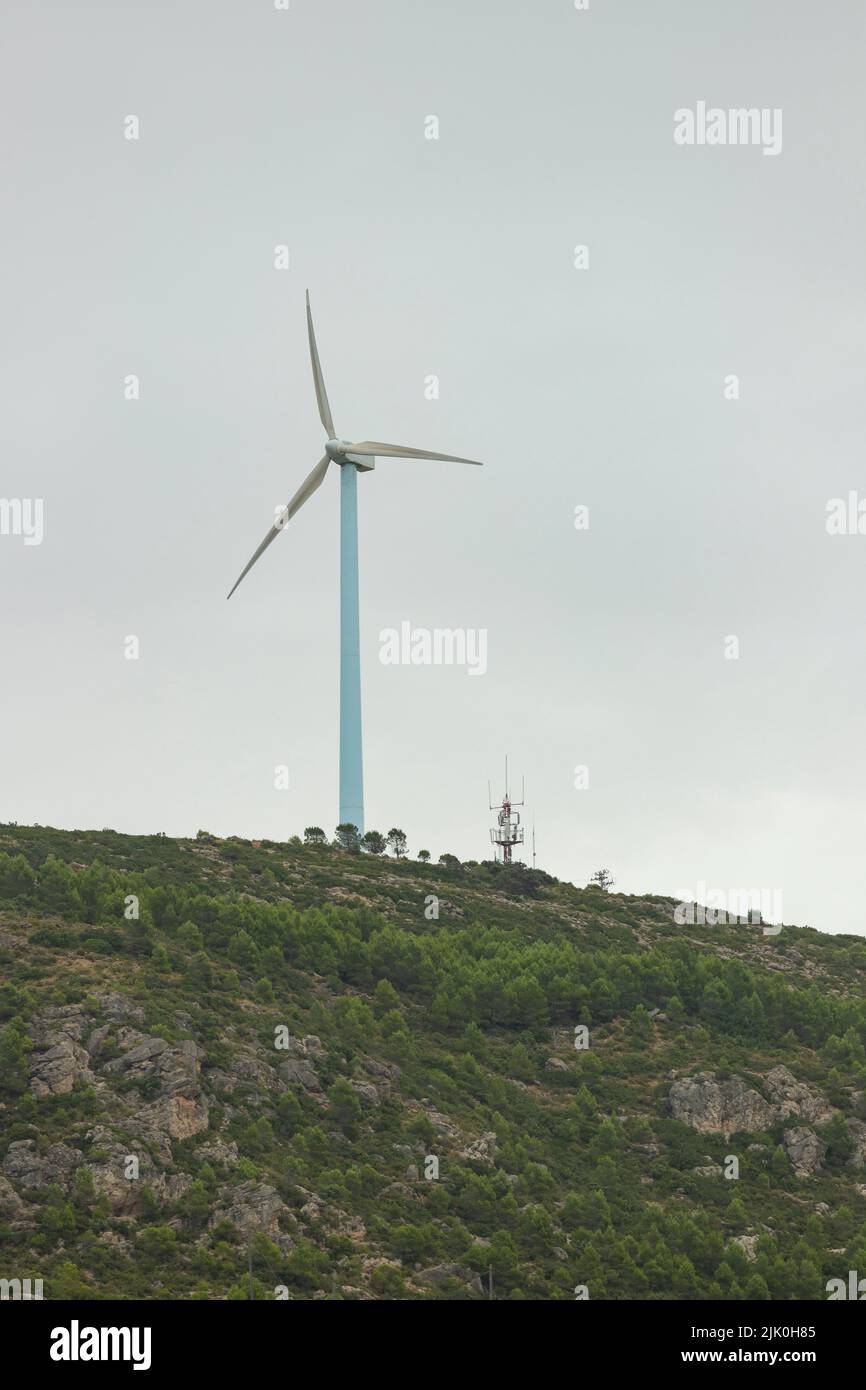 Wind turbines. Windmill in motion generating clean and renewable energy ...