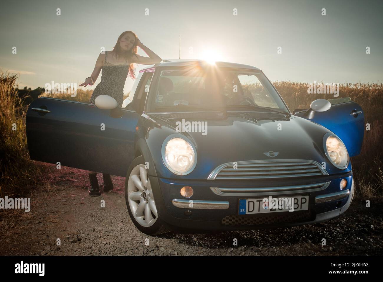 Girl with Minicooper Stock Photo - Alamy
