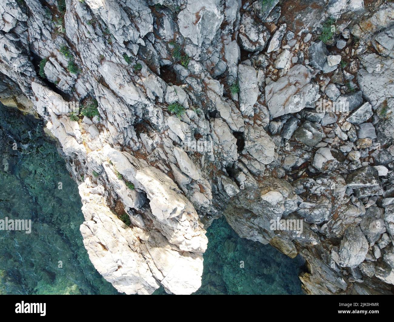 An aerial view of high range rocky cliffs by the sea in Croatia Stock ...