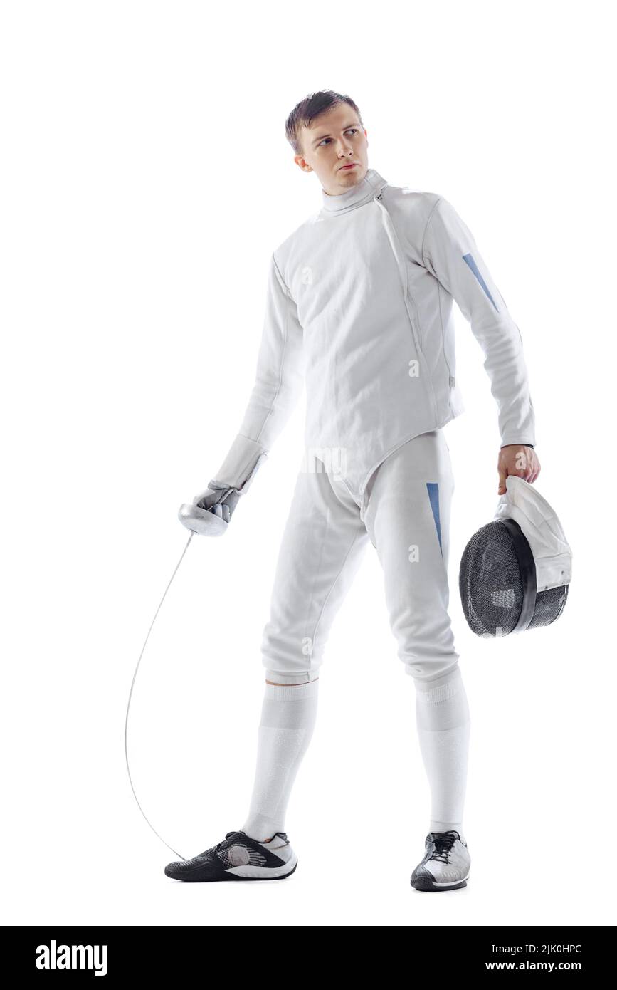 Portrait of professional male fencer in fencing costume and mask ...