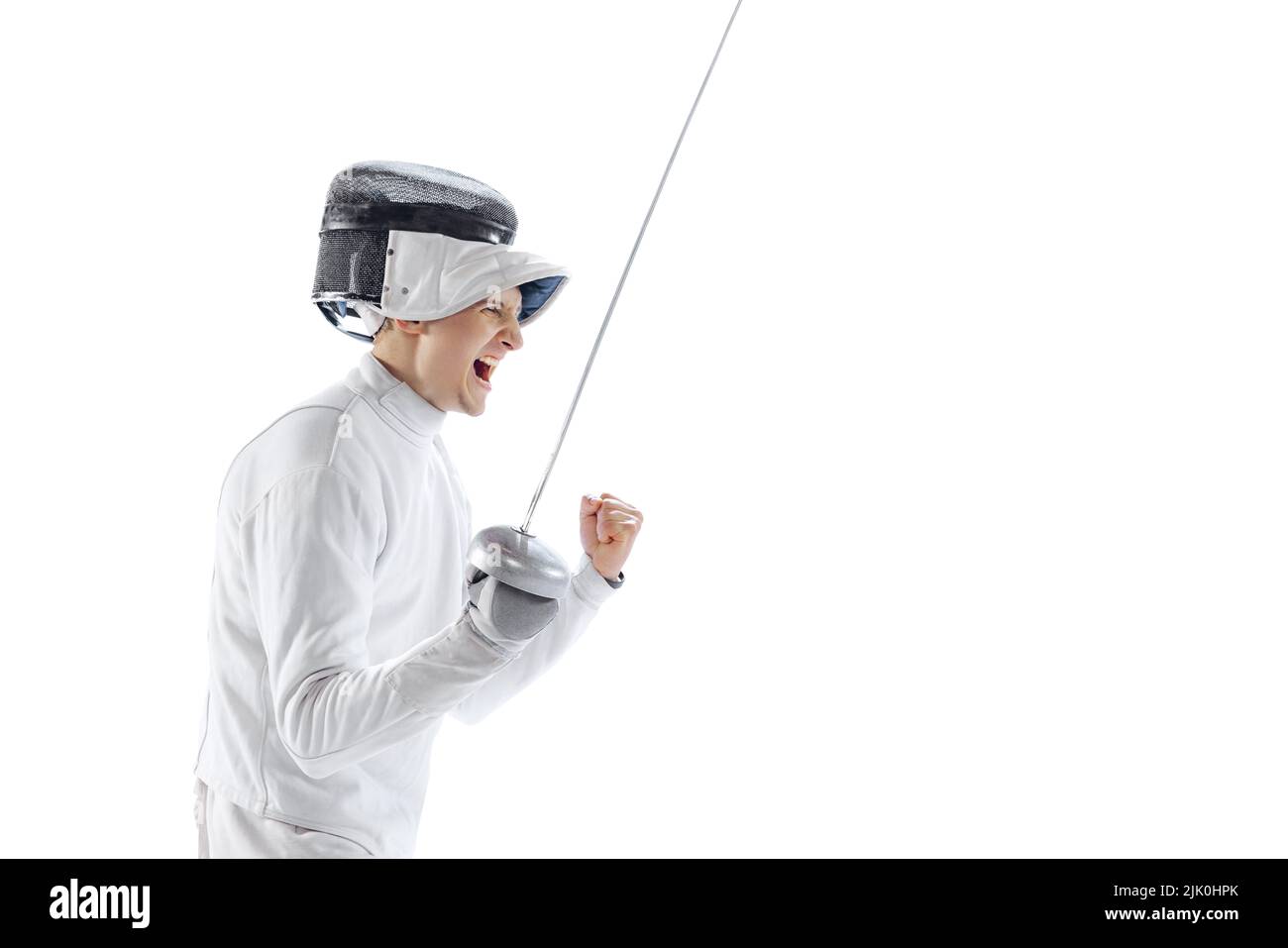 Portrait of professional male fencer in fencing costume and mask ...