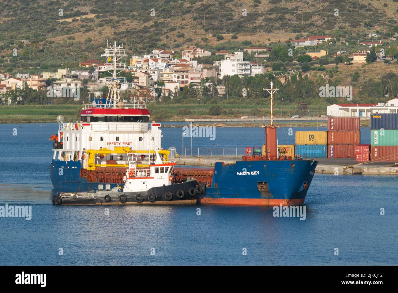 tugboat a small, powerful boat used to push or pull barges or to help ...