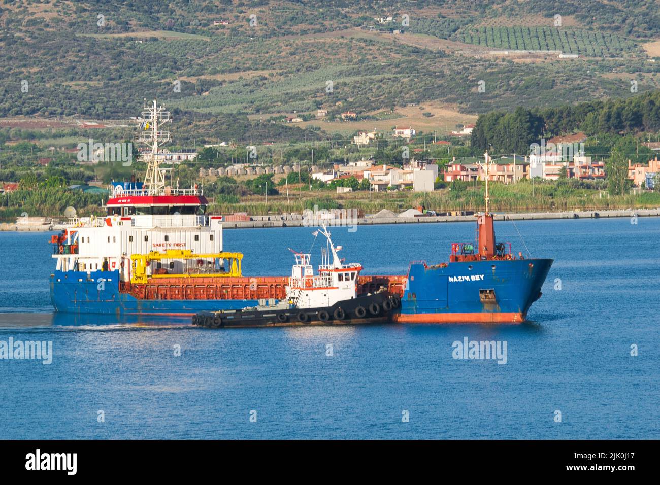 A tugboat a small, powerful boat used to push or pull barges or to help ...