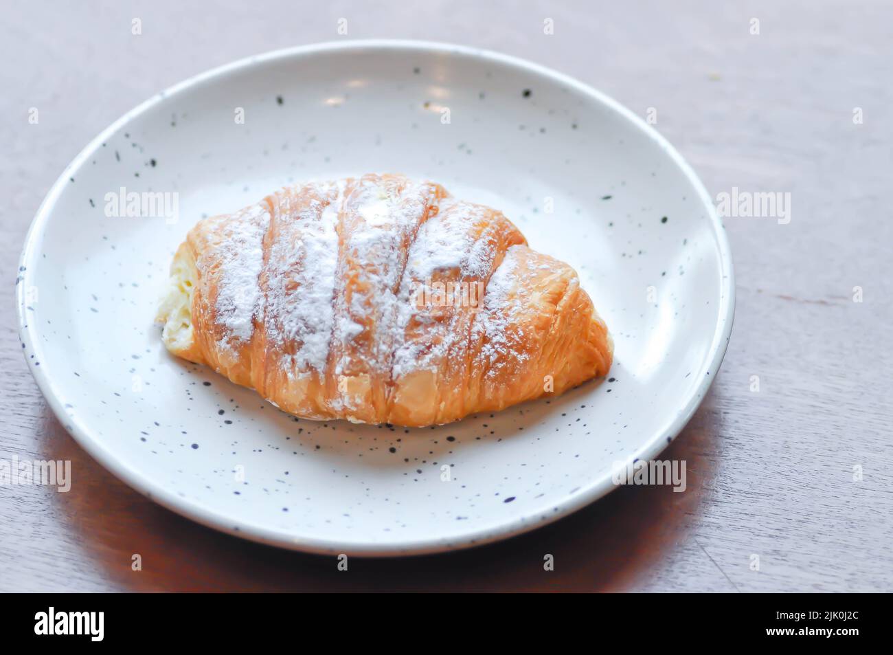 croissant , French croissant or French bread with icing sugar Stock ...