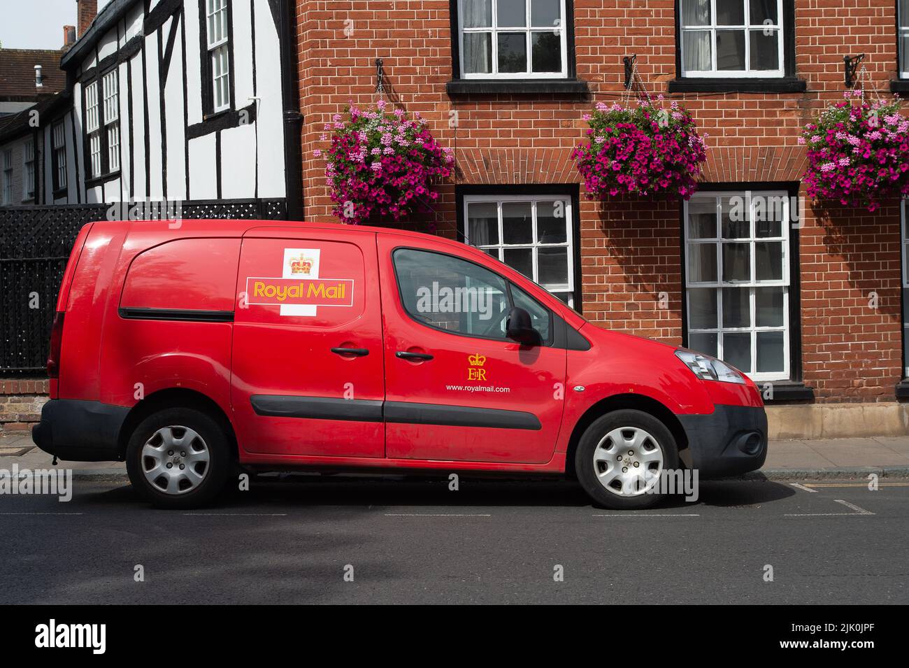 Royal mail van parked in high street hi-res stock photography and ...