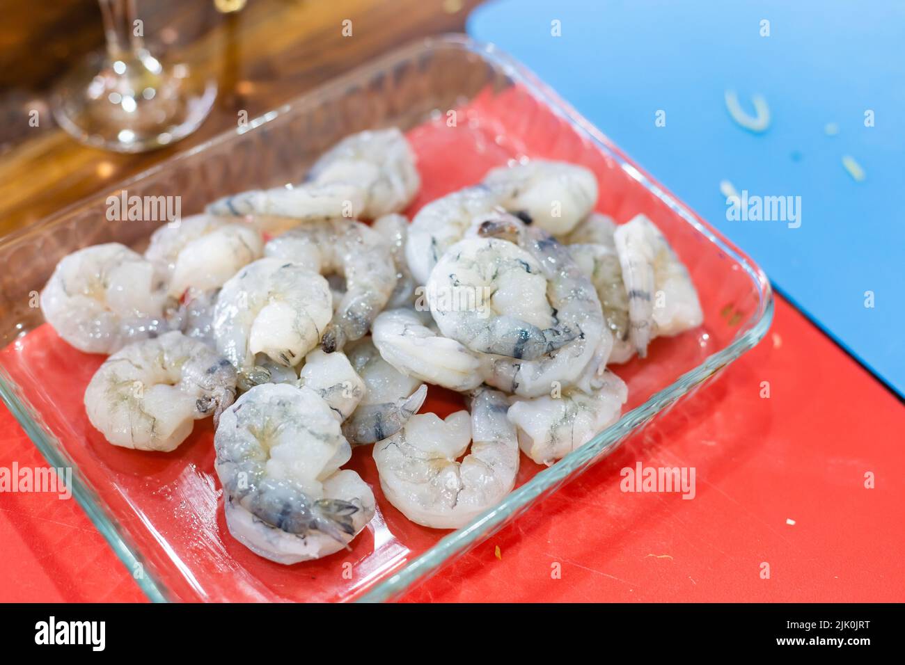 raw peel prawns in a white bowl without a marinate Stock Photo - Alamy