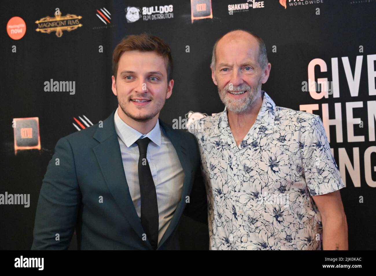 Daniel Watson and his dad attends "GIVE THEM WINGS" Film premieres in ...