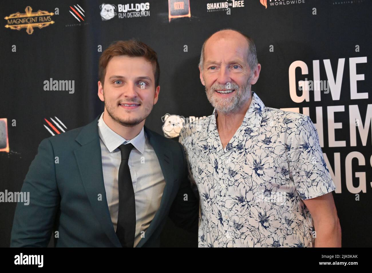 Daniel Watson and his dad attends "GIVE THEM WINGS" Film premieres in ...