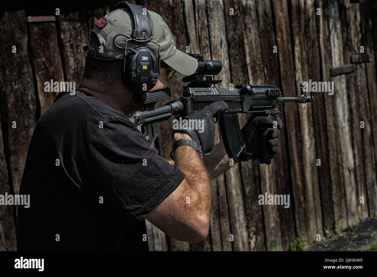Man shooting gun wood hi-res stock photography and images - Alamy
