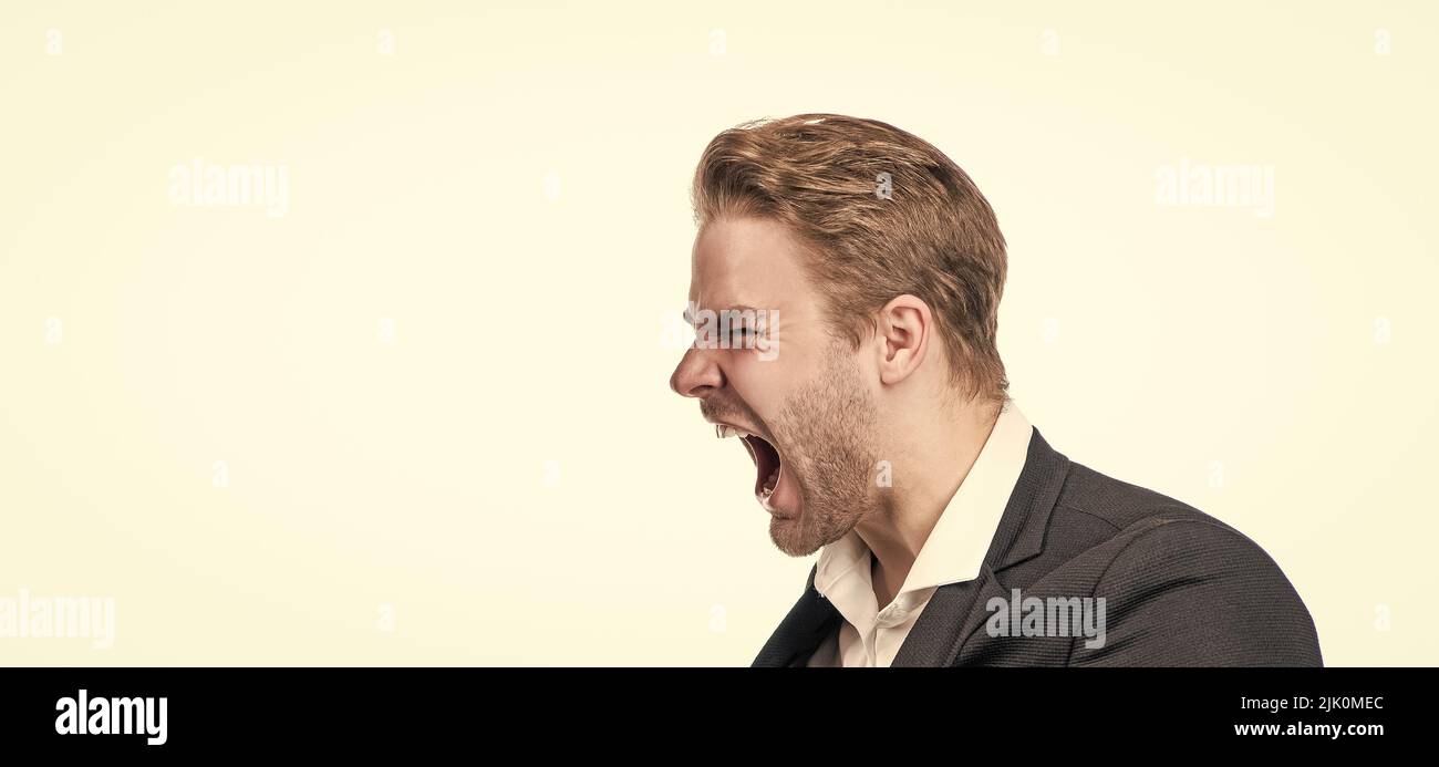 Roar of anger. Businessman scream in anger. Angry manager side-face ...