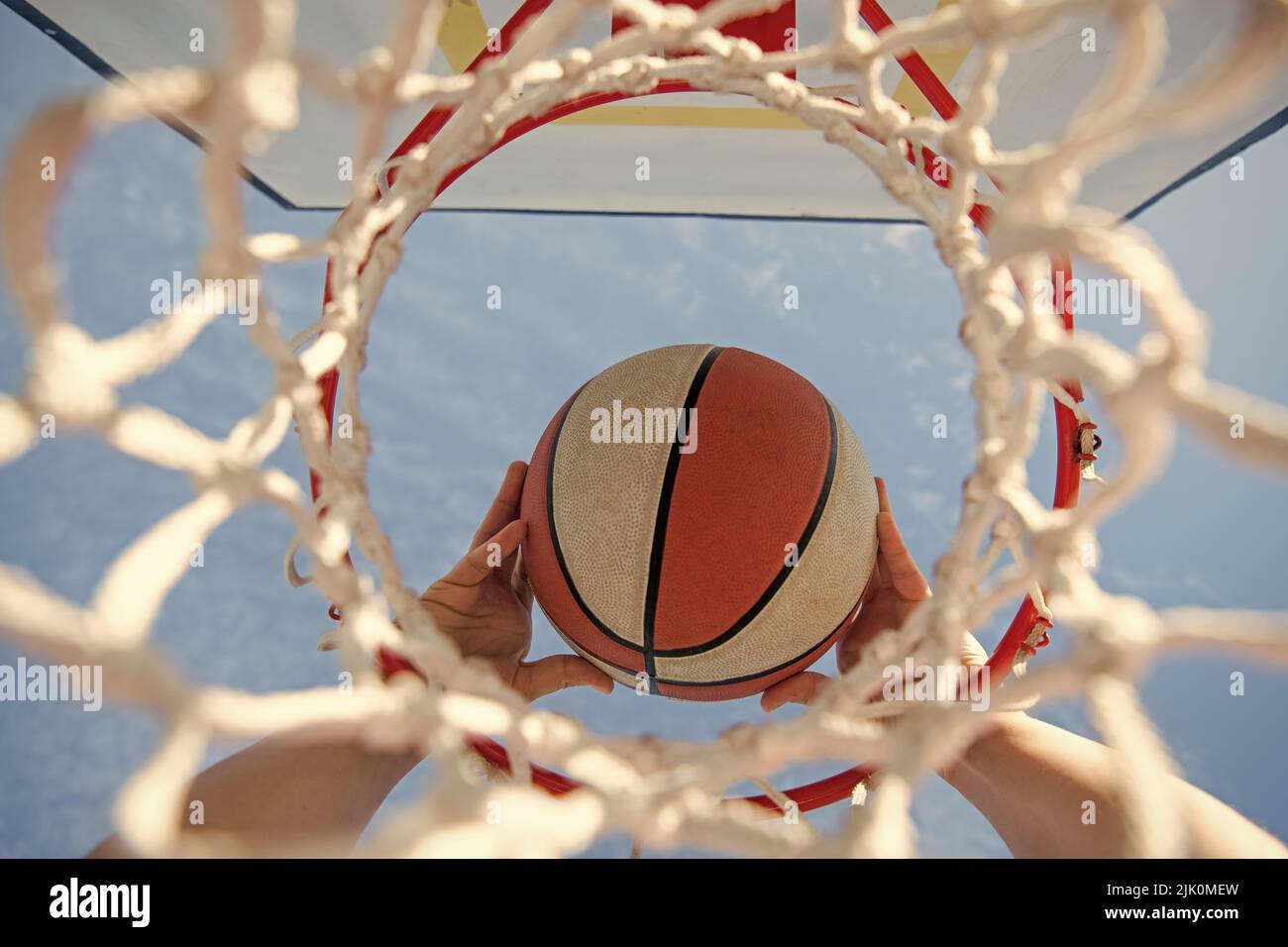 basketball player throws the ball into the hoop, sport Stock Photo - Alamy
