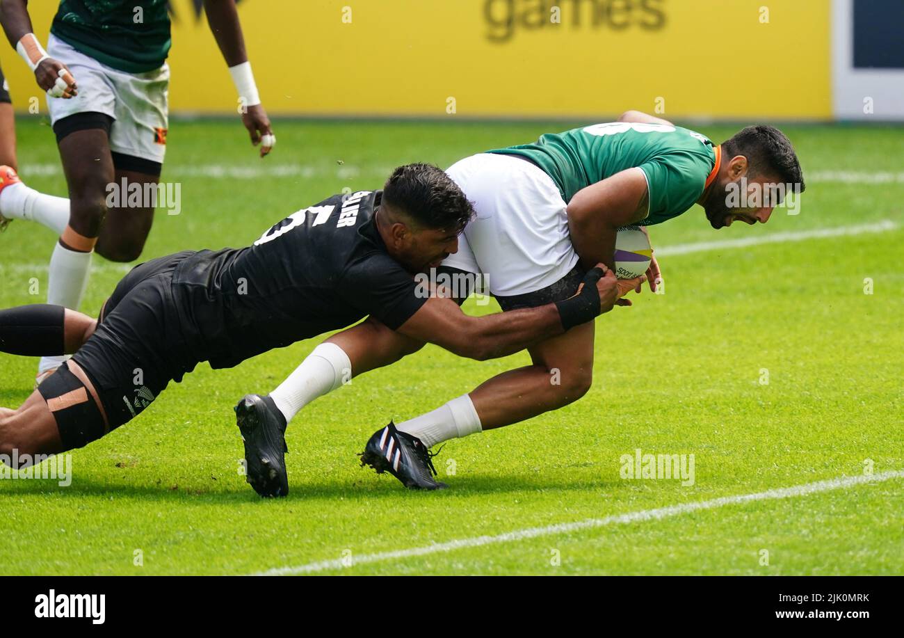 Sri Lanka's Ashan Ratwatte (right) scores against New Zealand during ...