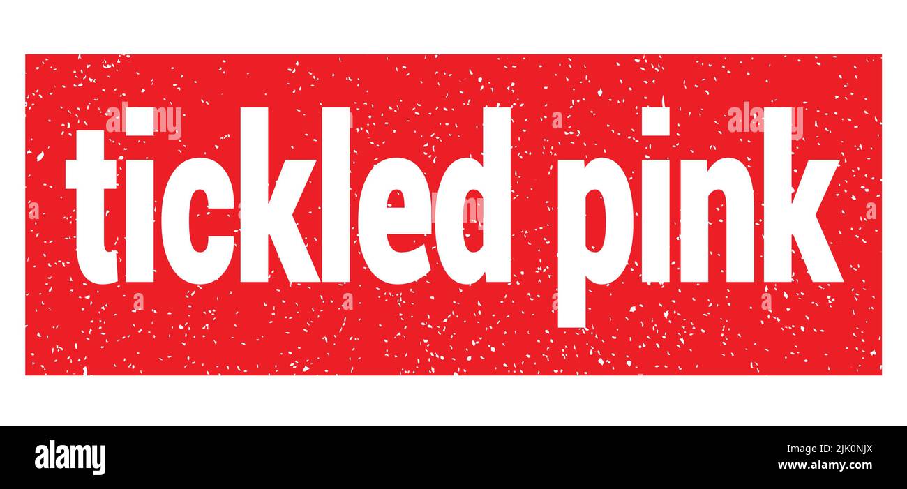 tickled pink text written on red grungy stamp sign Stock Photo - Alamy