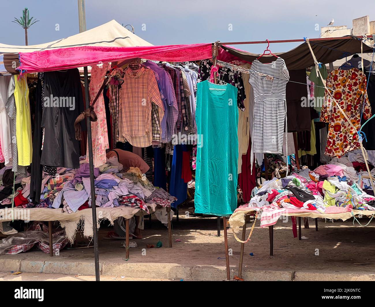 Marketplace for secondhand clothes in Morocco Stock Photo - Alamy