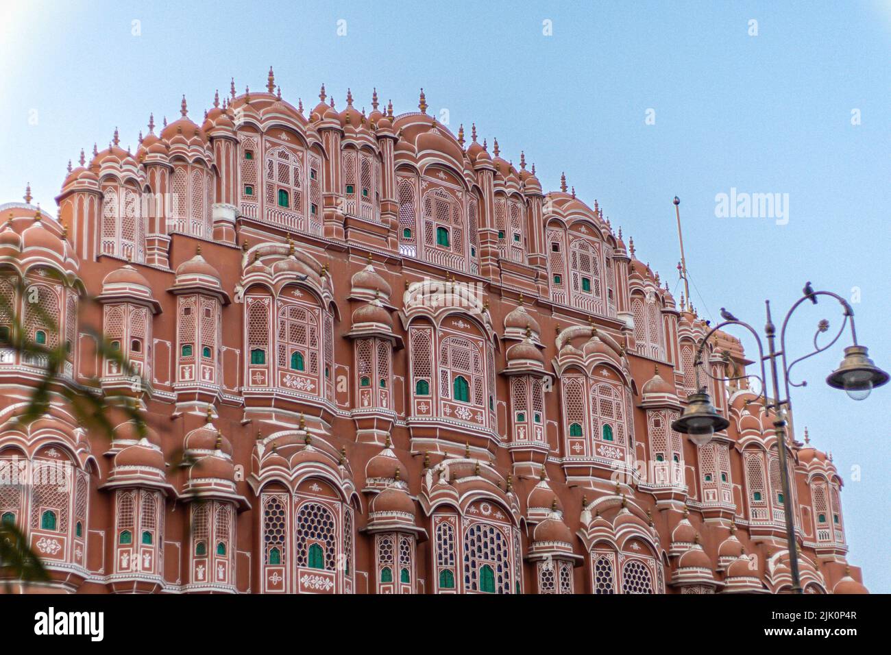 The Hawa Mahalhistorical palace in Jaipur, India against blue sky Stock ...