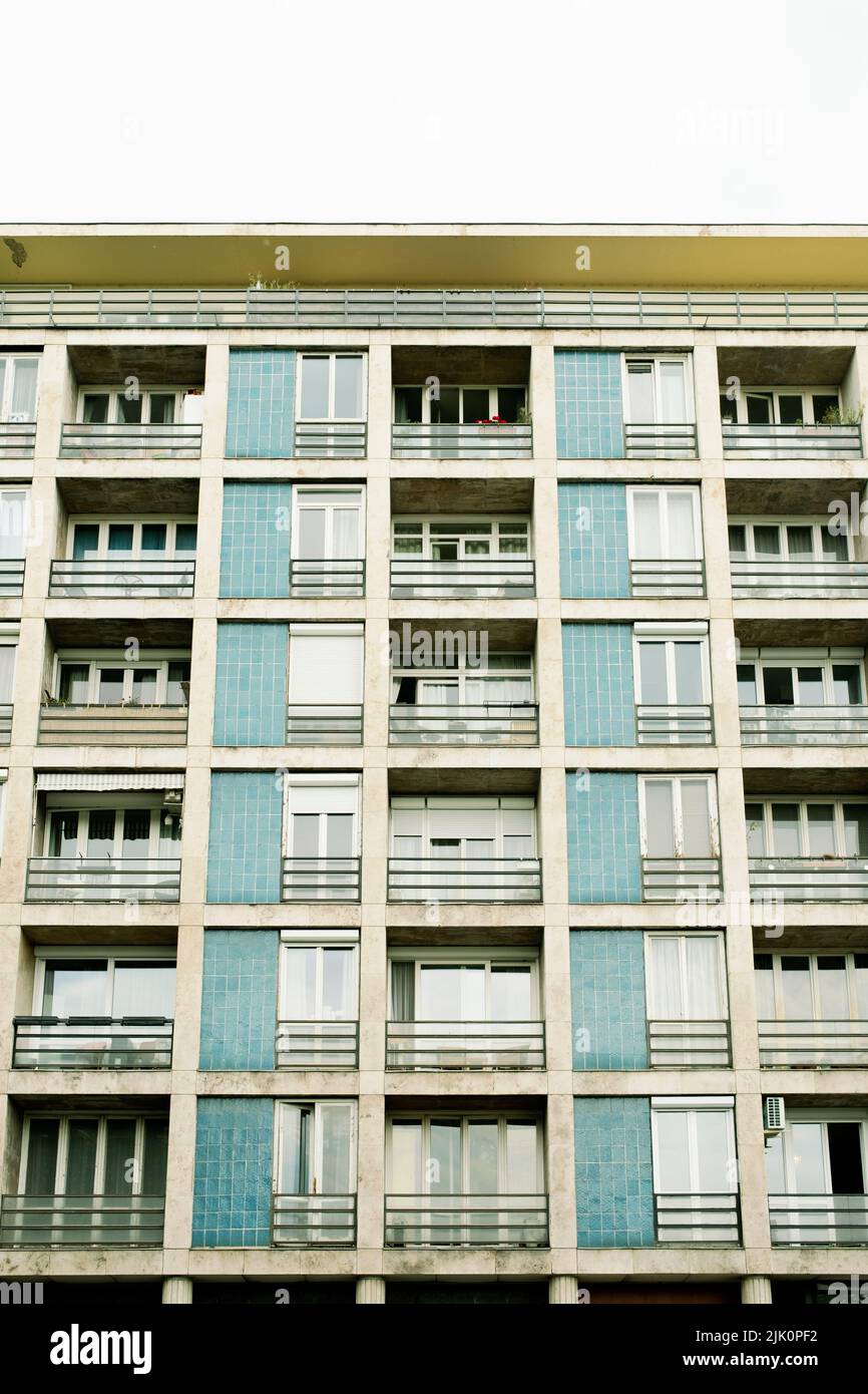 A vertical shot of a modern building in Budapest, Hungary with windows ...