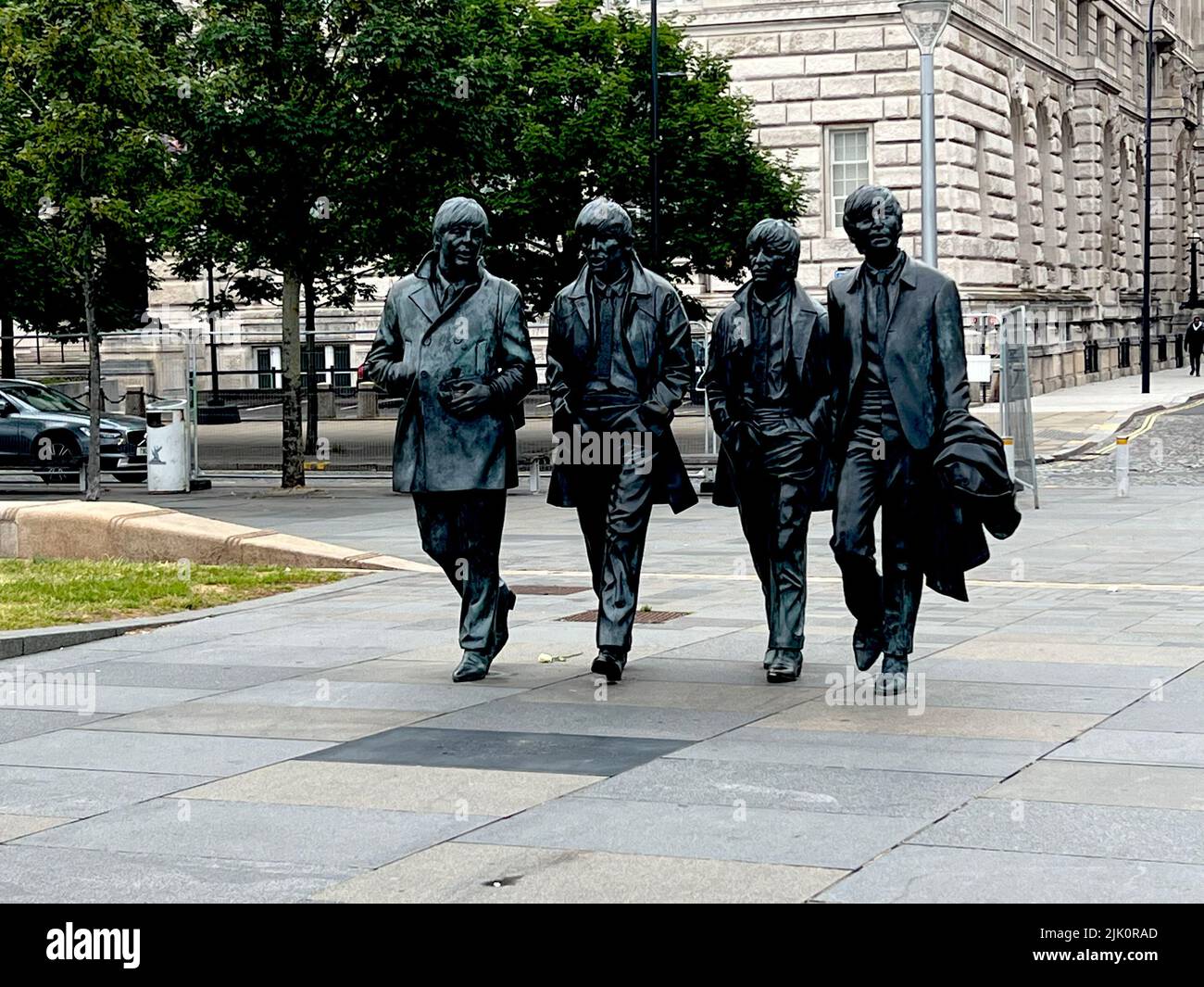 A beautiful shot of the Beatles statue on the street of Liverpool, UK ...