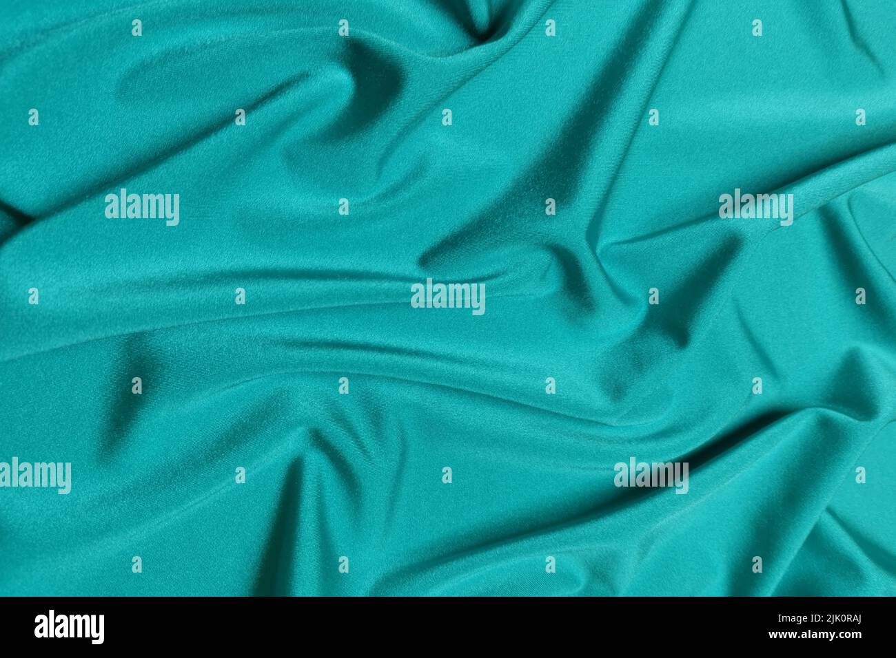 Blue crepe satin crumpled or wavy fabric texture background. Abstract ...