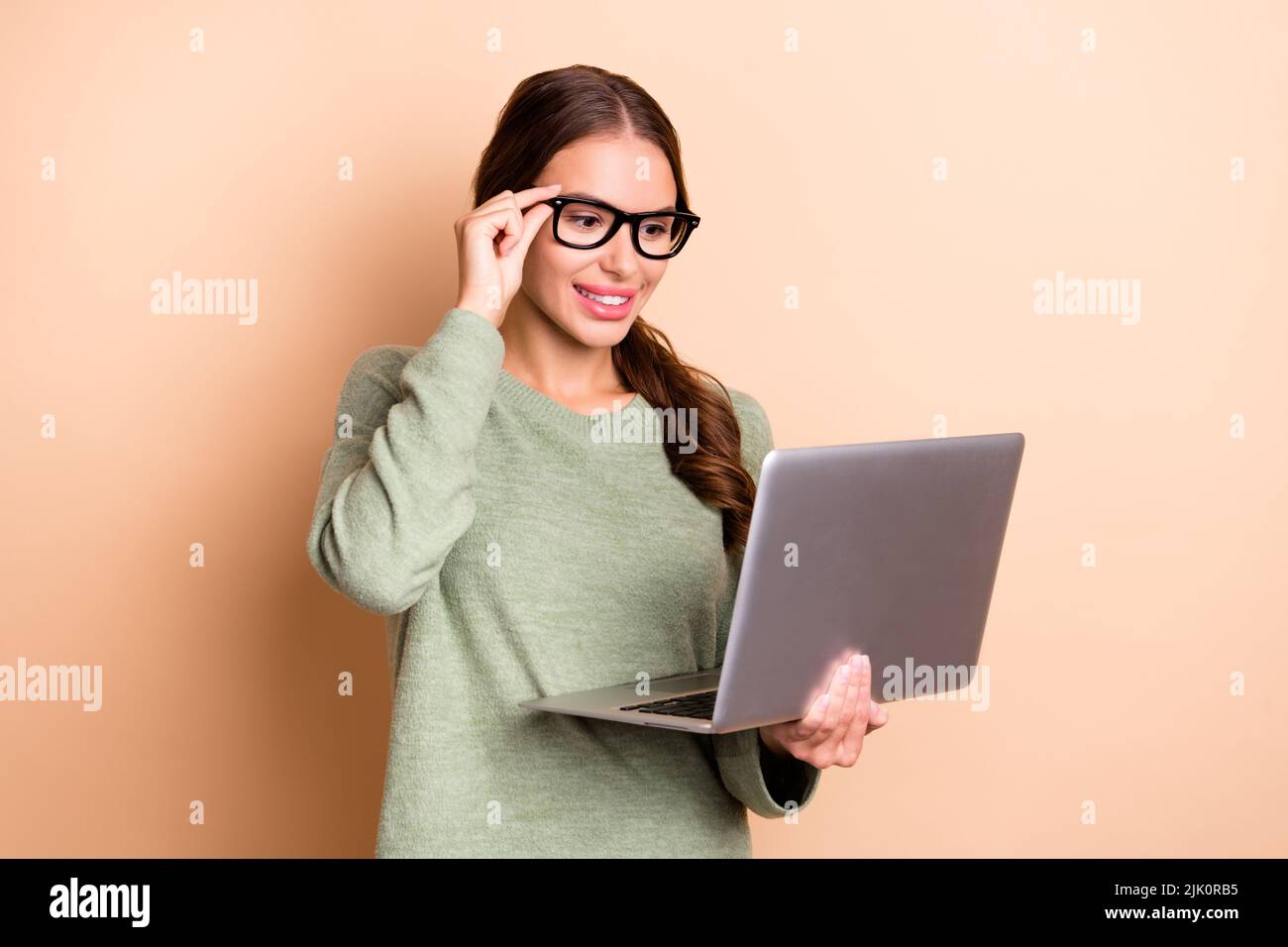 Photo of confident sweet girl dressed green pullover hand eyewear ...