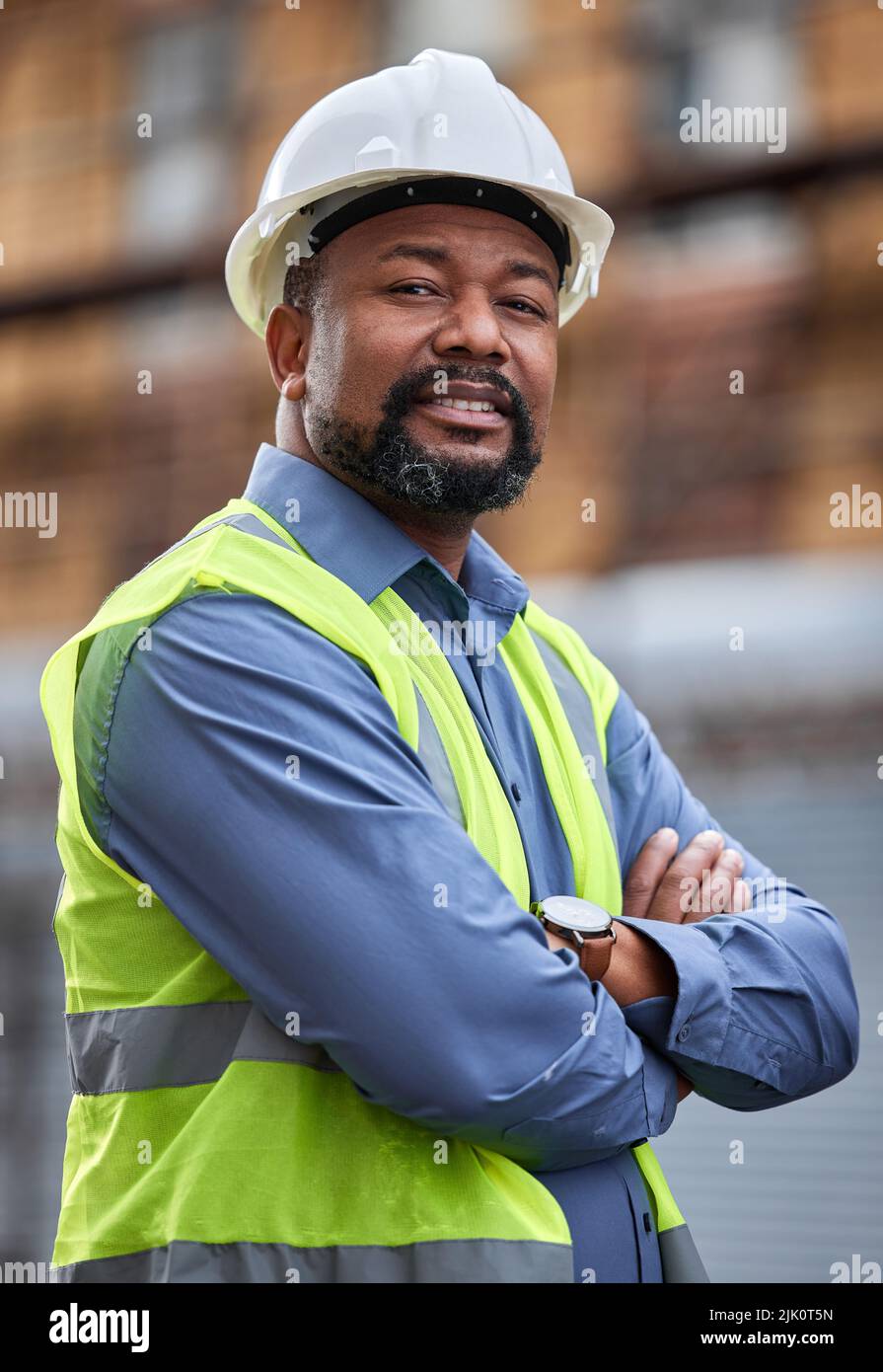 Well yes, I can build a house. Portrait of a proud contractor posing ...