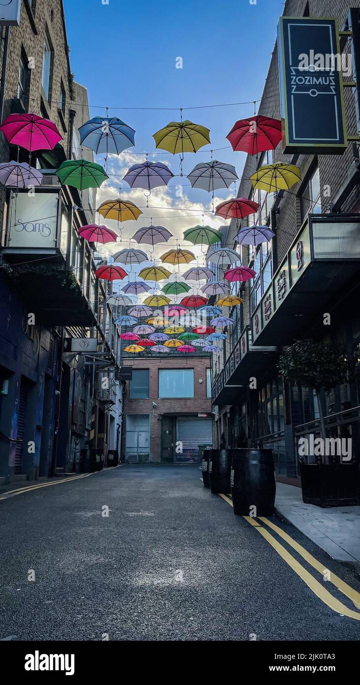 A vertical of a street in Dublin, Ireland decorated with colorful ...