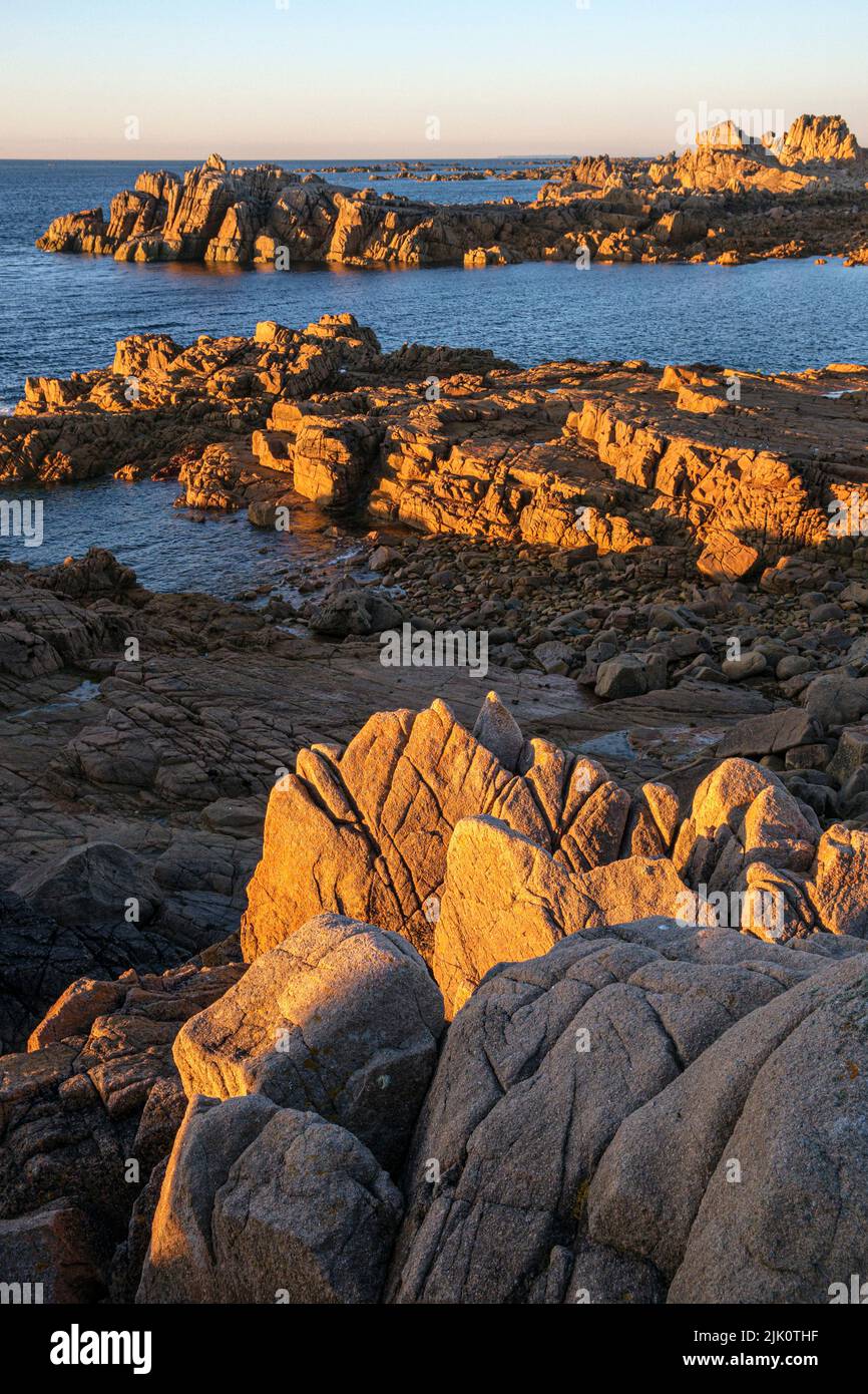 Last light on the rocky coast near Fort Hommet, Vazon Bay, Guernsey ...