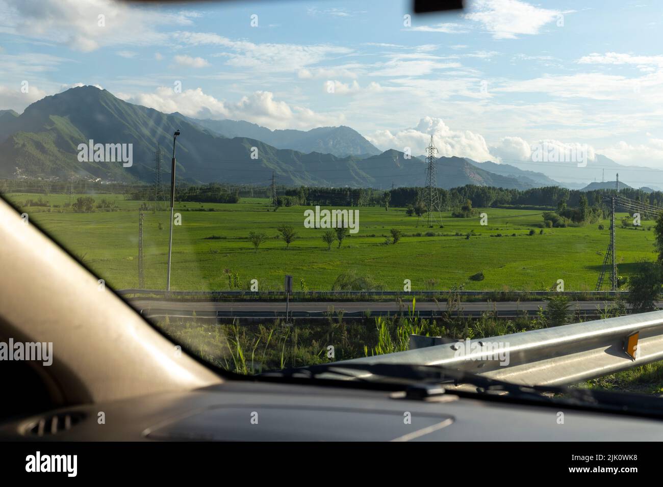 Beautiful scenery of rice field from the car dashboard Stock Photo - Alamy
