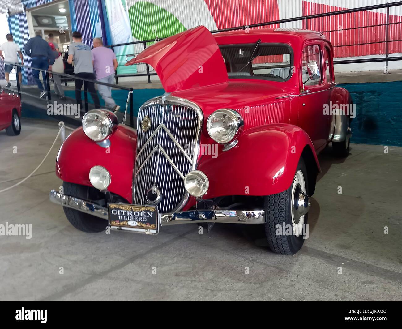 vintage red elegant Citroen 11 Traction Avant Legere in a warehouse ...