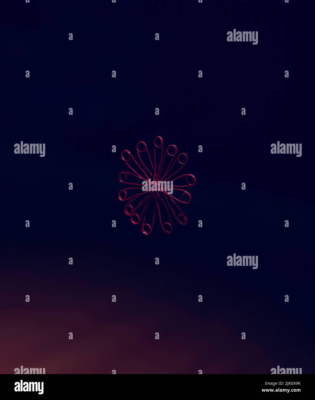 The vertical view of a flower made of purple wires Stock Photo - Alamy