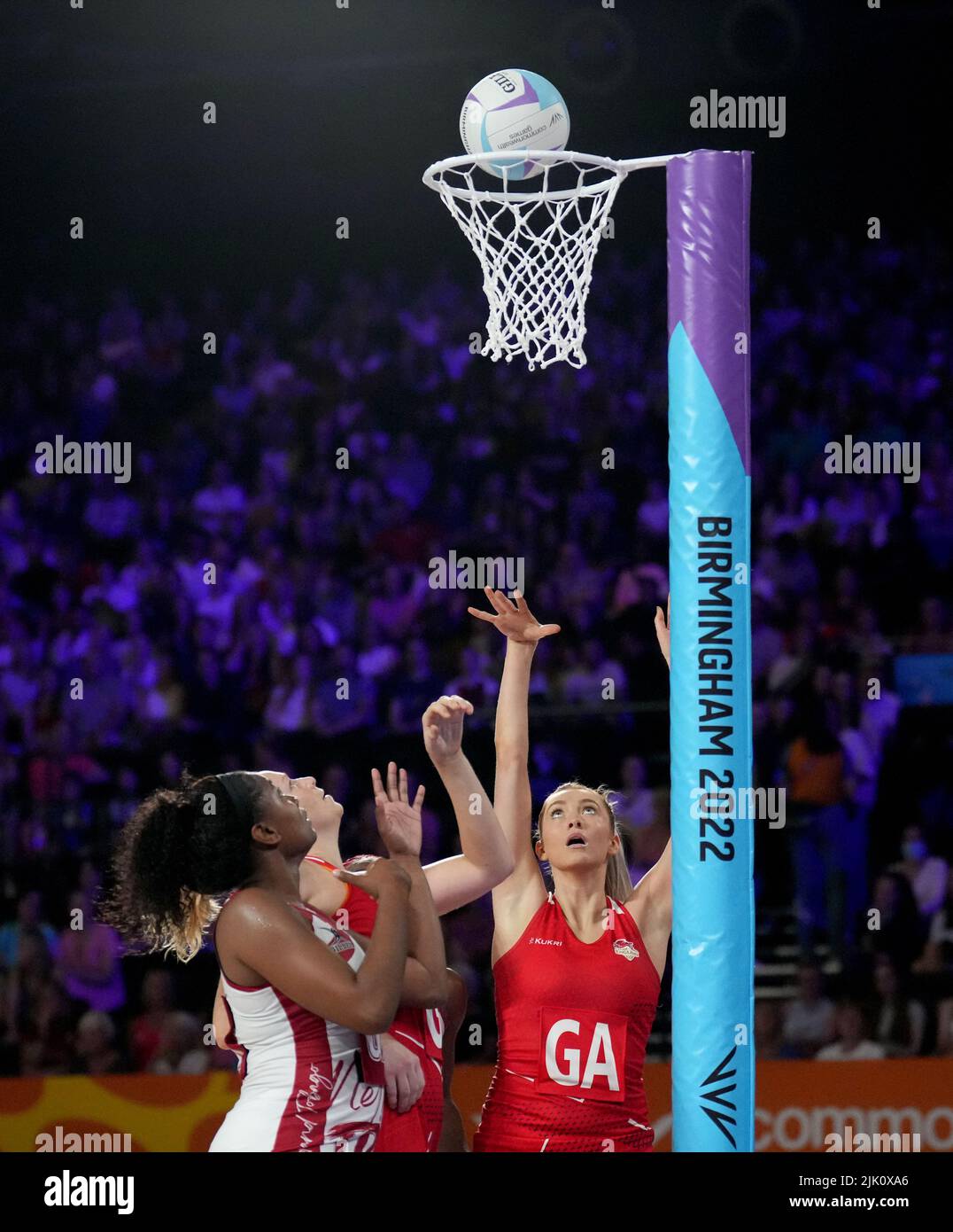 England’s Helen Housby shoots during the Pool B Netball match between ...