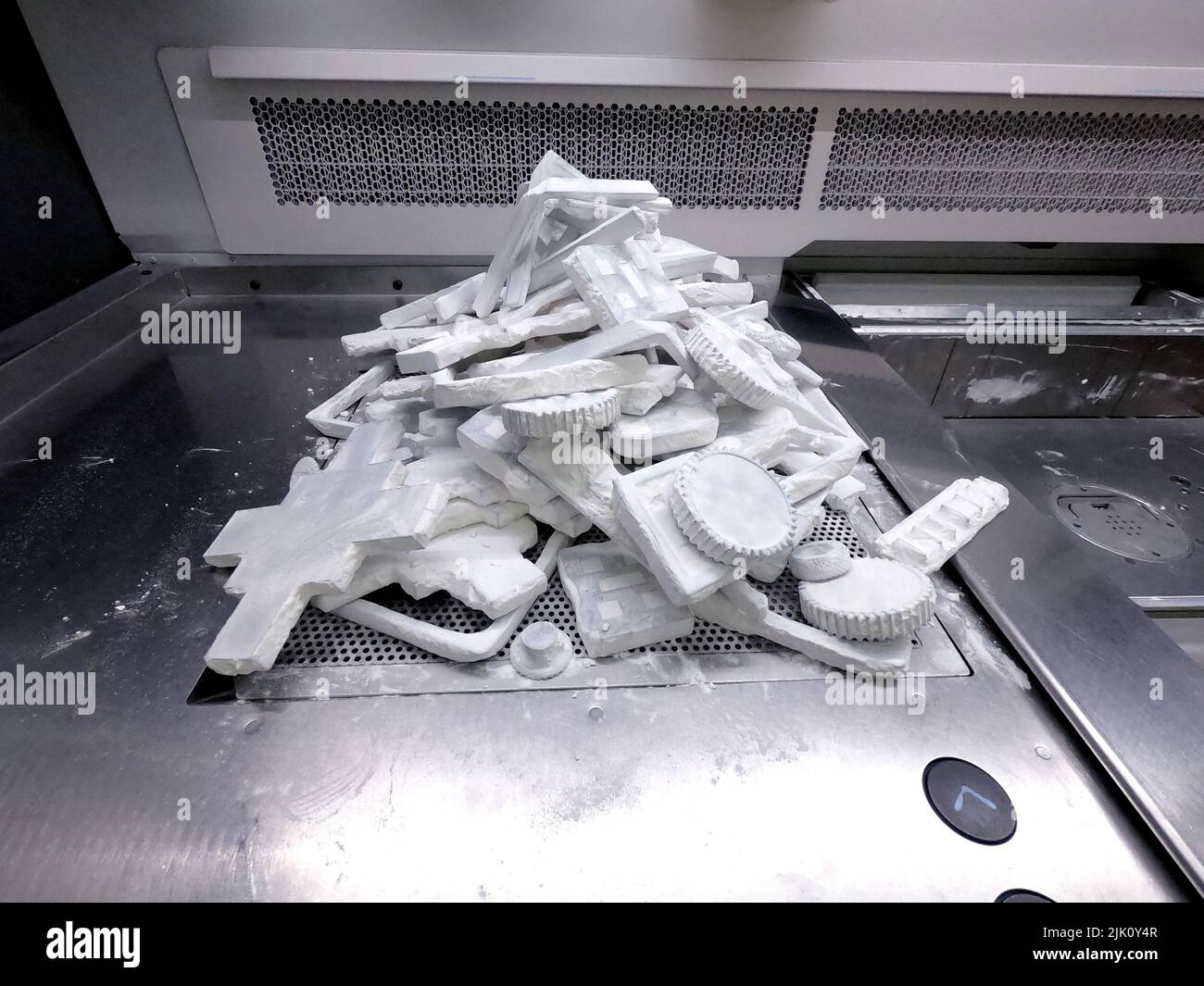 Objects and models printed on industrial 3D printer from white plastic ...