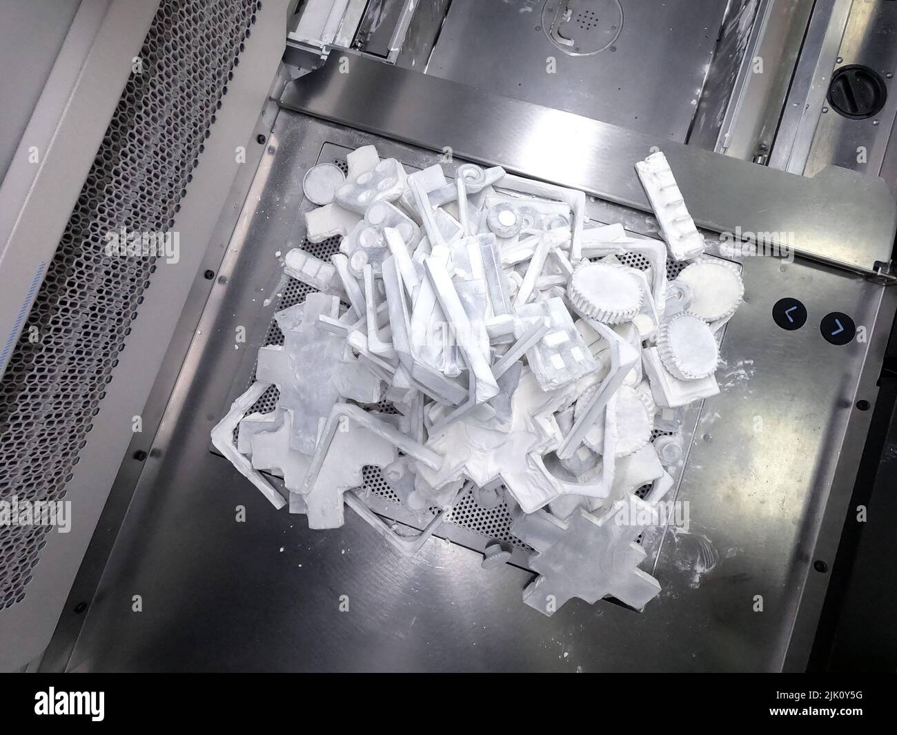 Objects and models printed on industrial 3D printer from white plastic ...