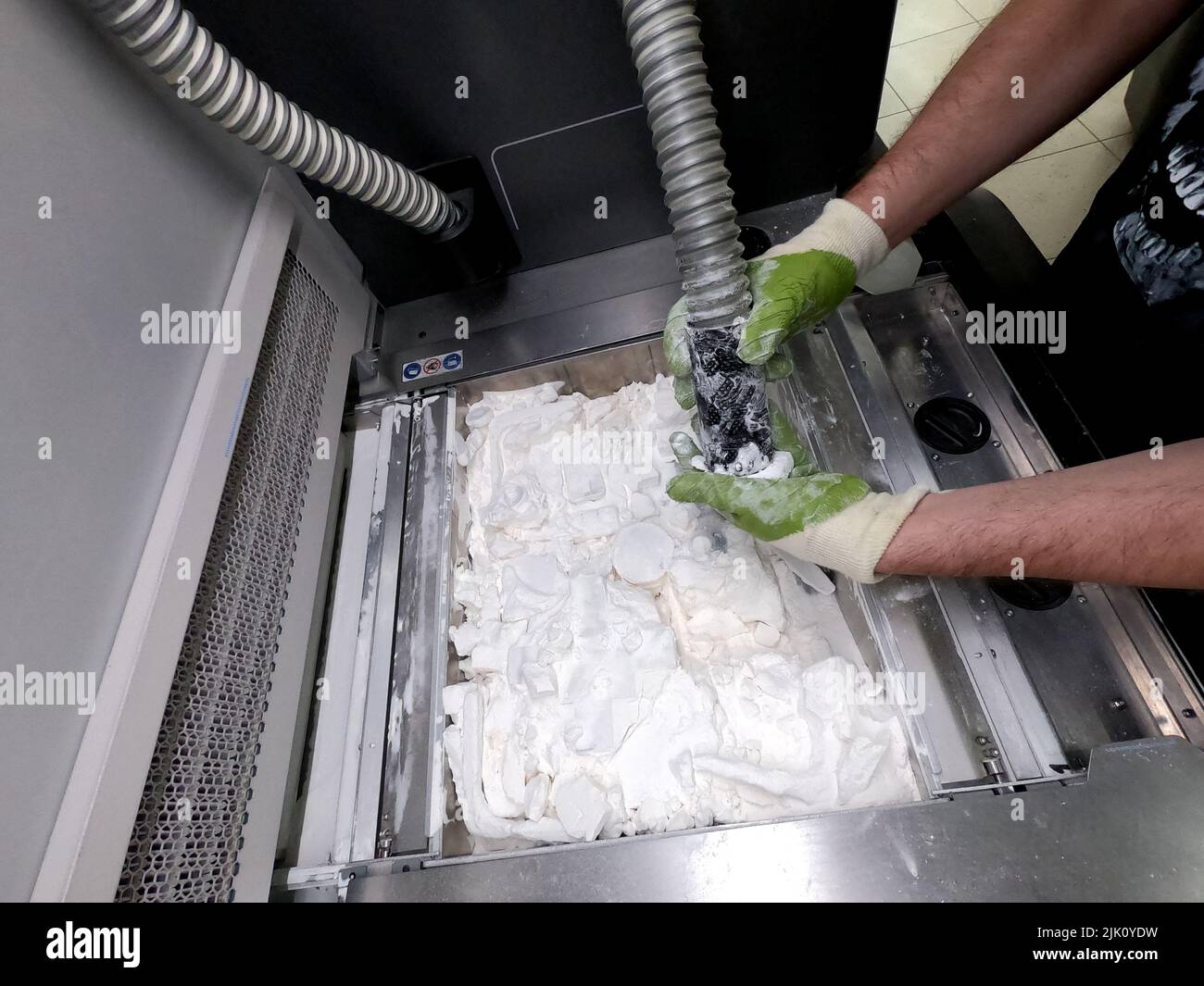 Engineer or artist designer printing 3D parts and shaping models from ...