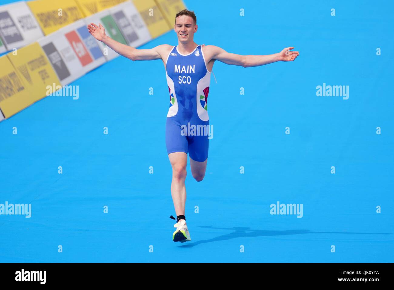 Scotland's Cameron Main celebrates as he crosses the line during the ...