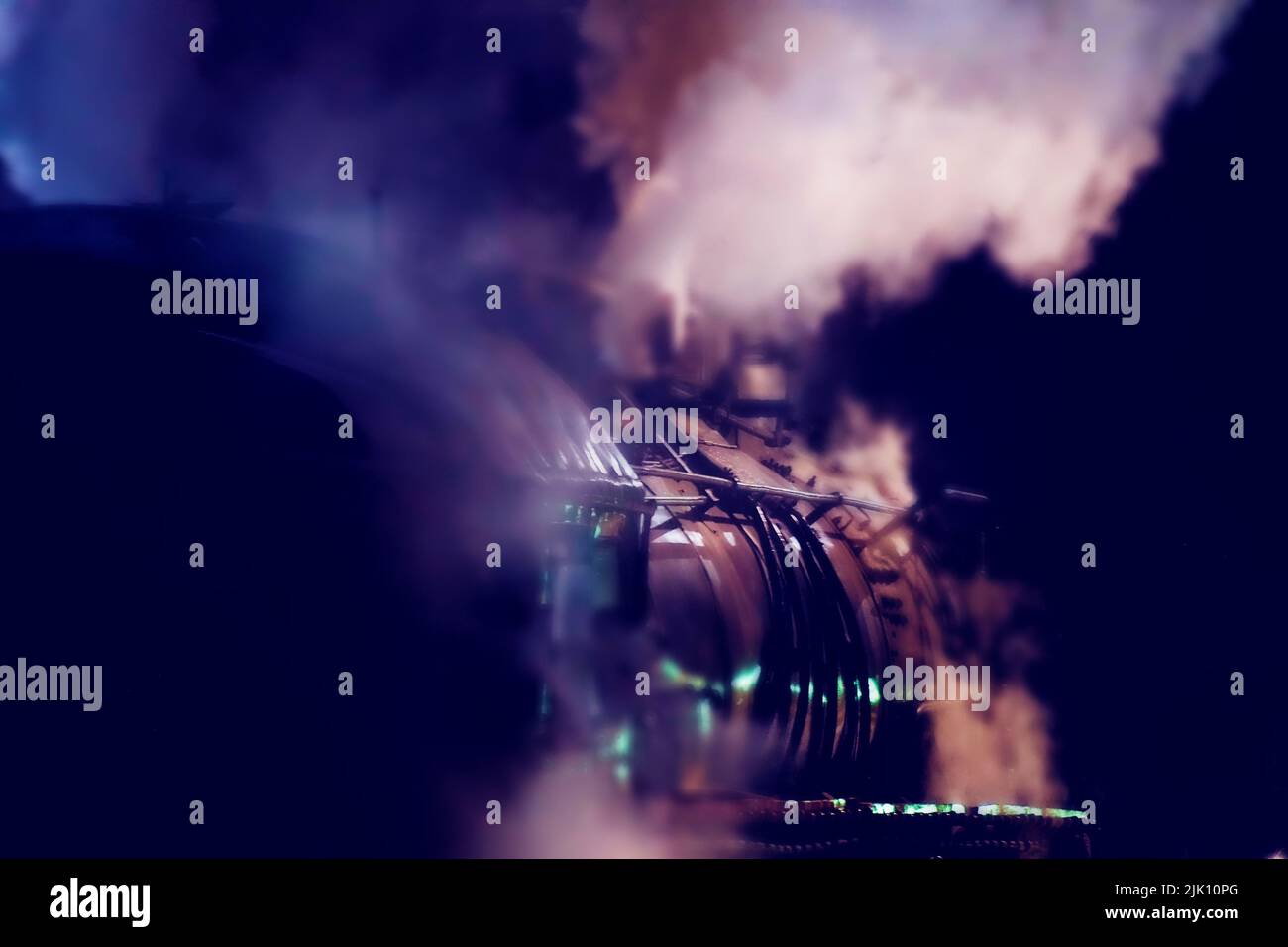 Steam locomotive under steam at night Stock Photo - Alamy