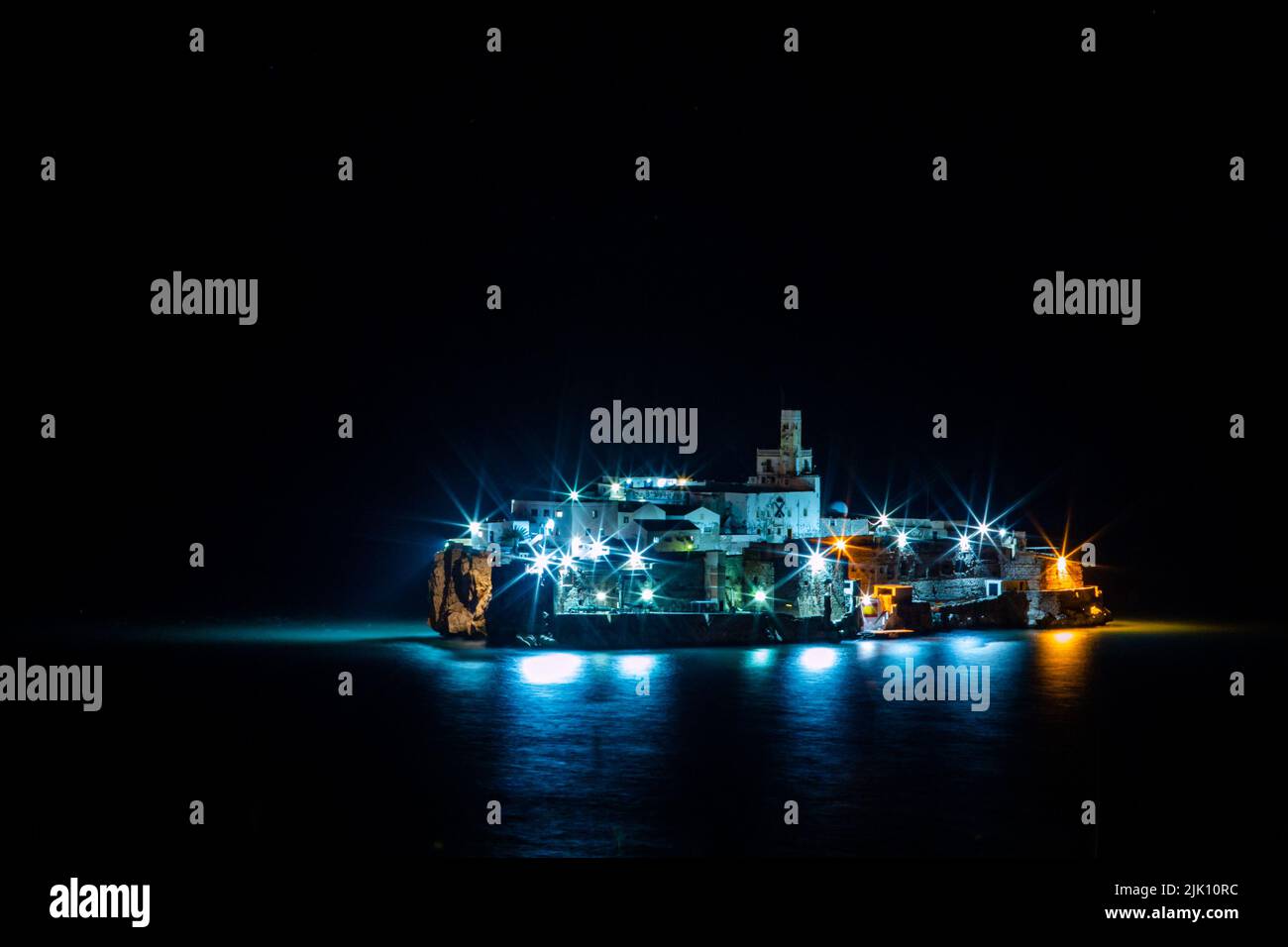 The islet of Penon de Alhucemas in Morocco by night Stock Photo - Alamy