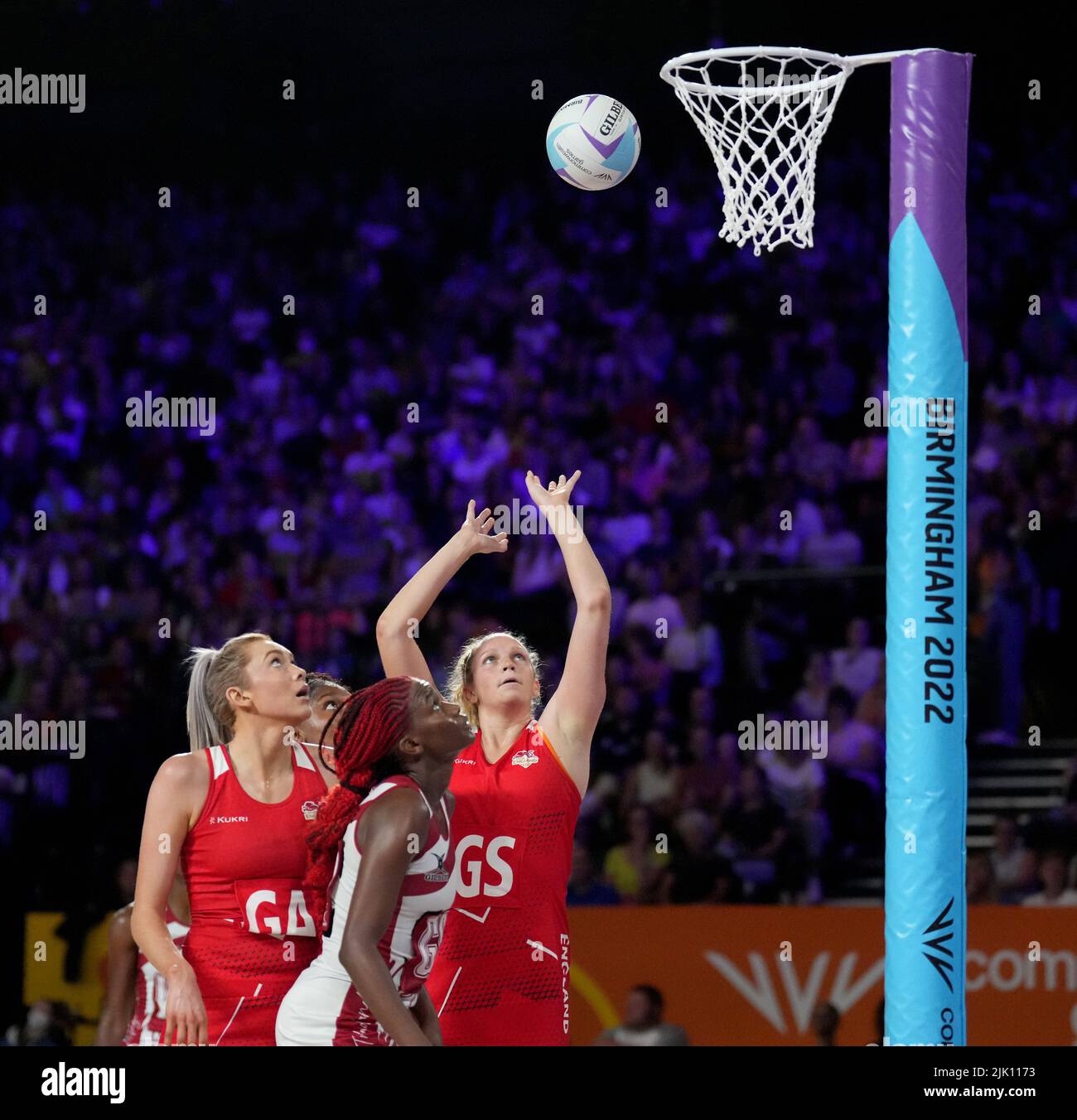 England’s Joanne Harten scores during the Pool B Netball match between ...