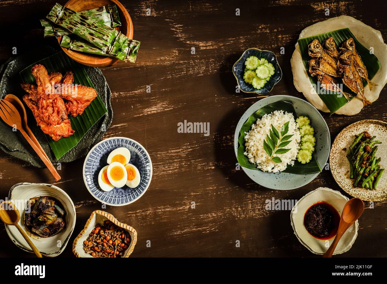 Nasi Lemak. Malay aromatic rice accompanied with various side dishes ...