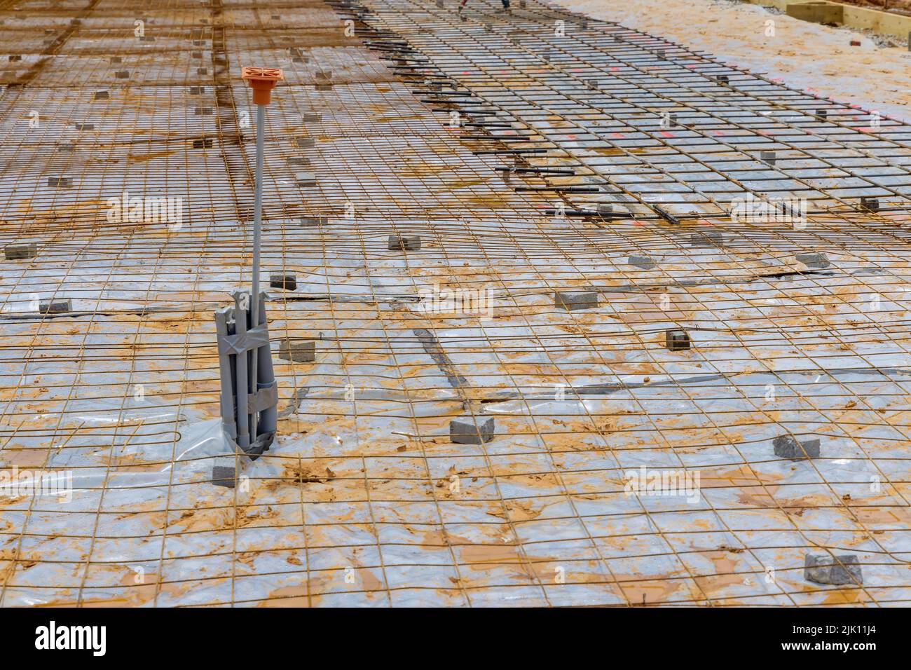 The process of making reinforcement steel bars for concrete foundations ...