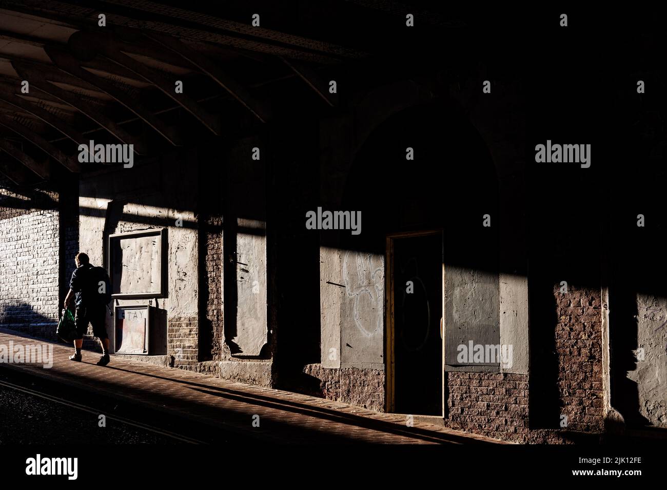 Pedestrian Under Bridge Stock Photo - Alamy