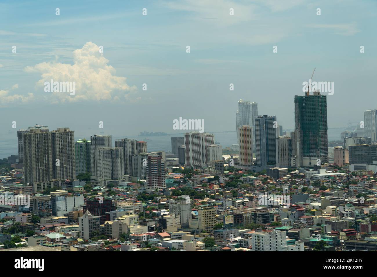 Skyscrapers and business centers in a big city Manila. Urban aerial ...