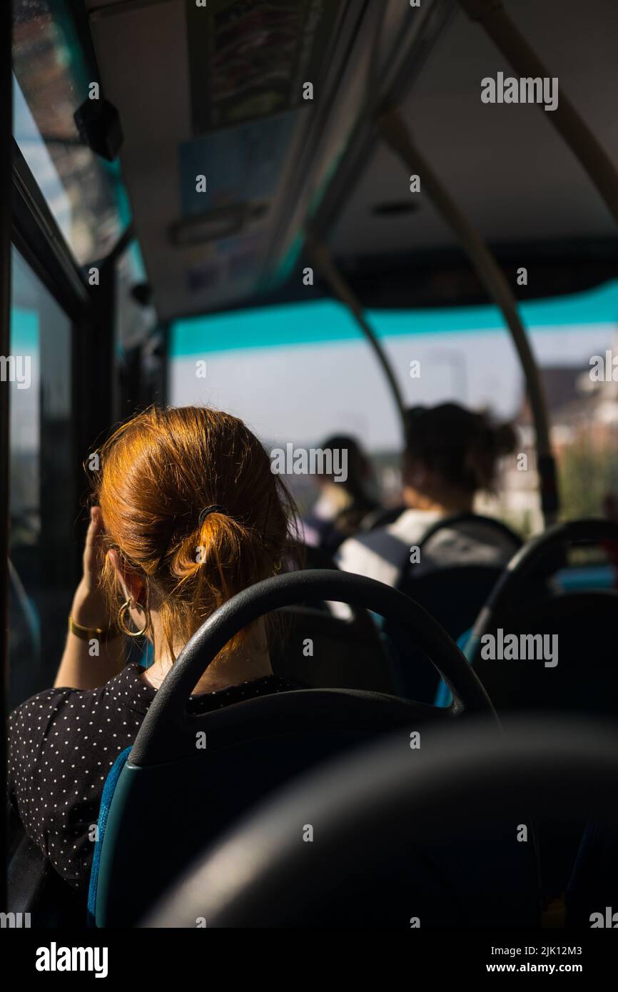 Woman on bus back view hi-res stock photography and images - Alamy