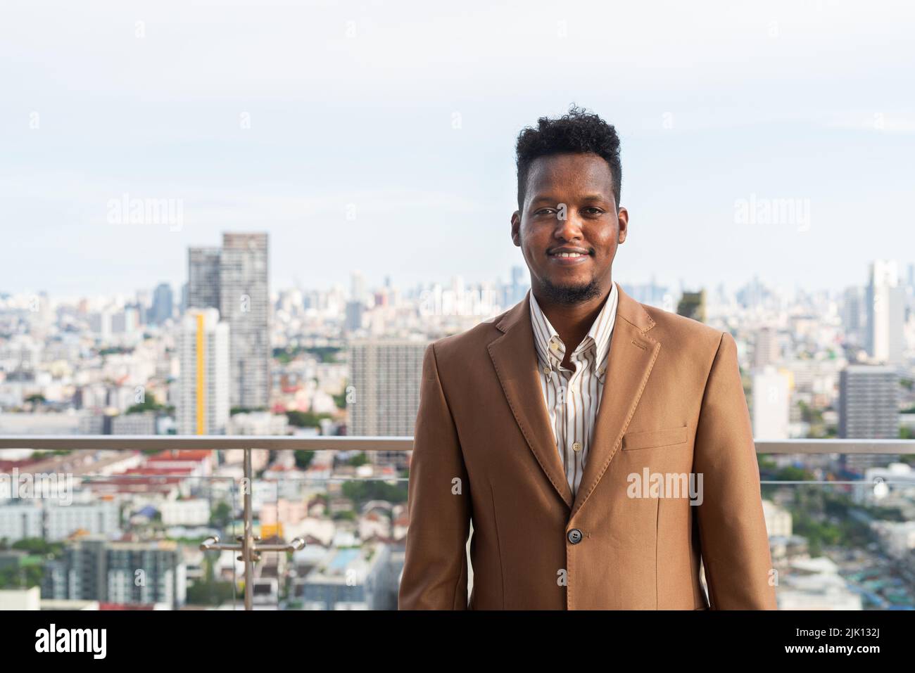 Portrait of handsome young African man Stock Photo - Alamy